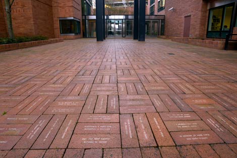 A courtyard of memories and love: Bricks and slates pay tribute to ...